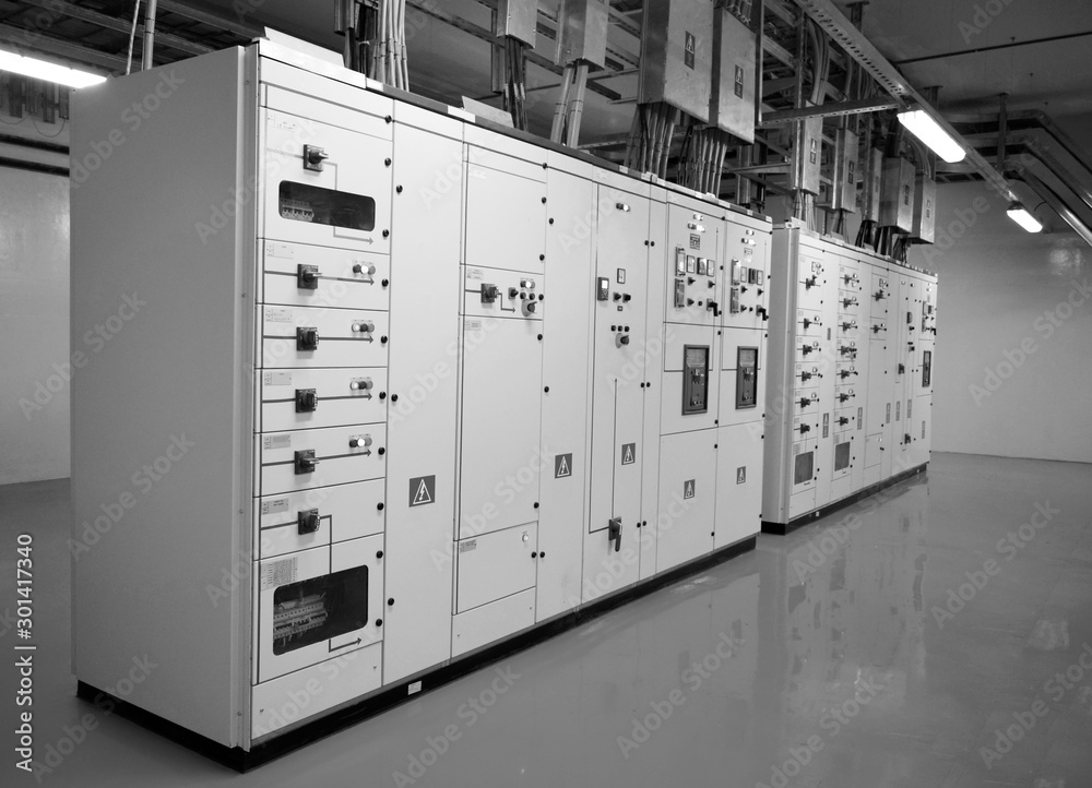 Electrical control cabinet and circuit breakers are usually securely ...
