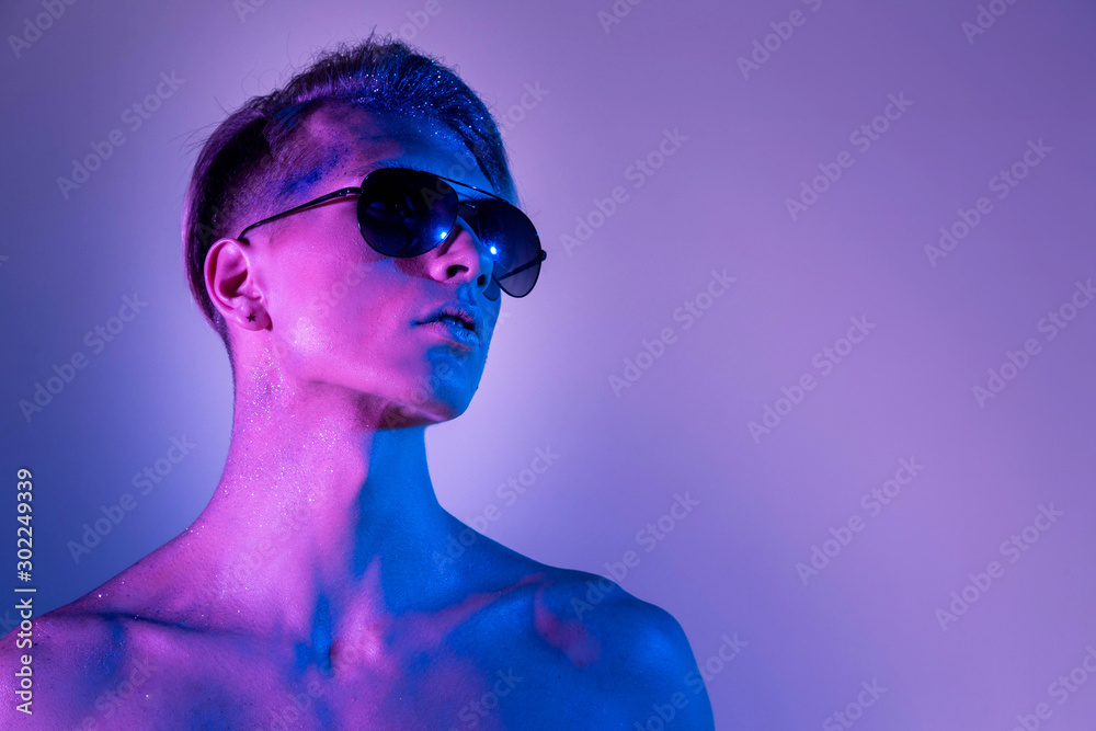 Handsome pumped up guy in black sunglasses. Sports guy, attractive male ...