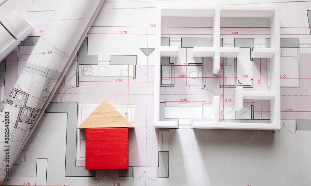 Construction concept. Residential building drawings and architectural ...