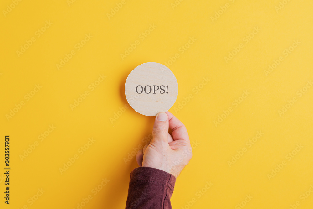 Oops sign on wooden cut circle Stock Photo | Adobe Stock