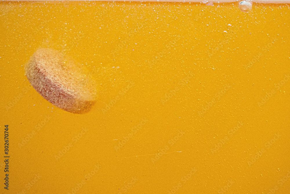 dissolving effervescent tablet in a water, antacid table with gas ...
