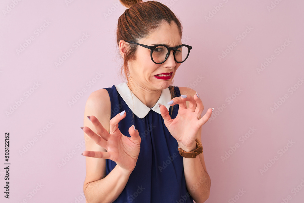 Redhead woman with pigtail wearing elegant dress and glasses over ...