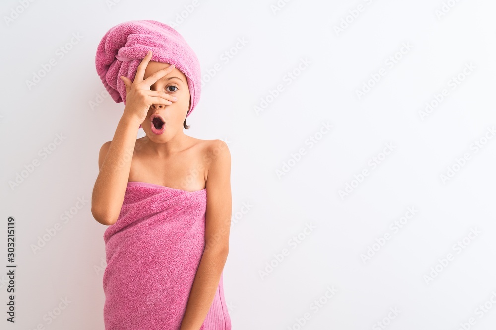 Beautiful child girl wearing shower towel after bath standing over ...