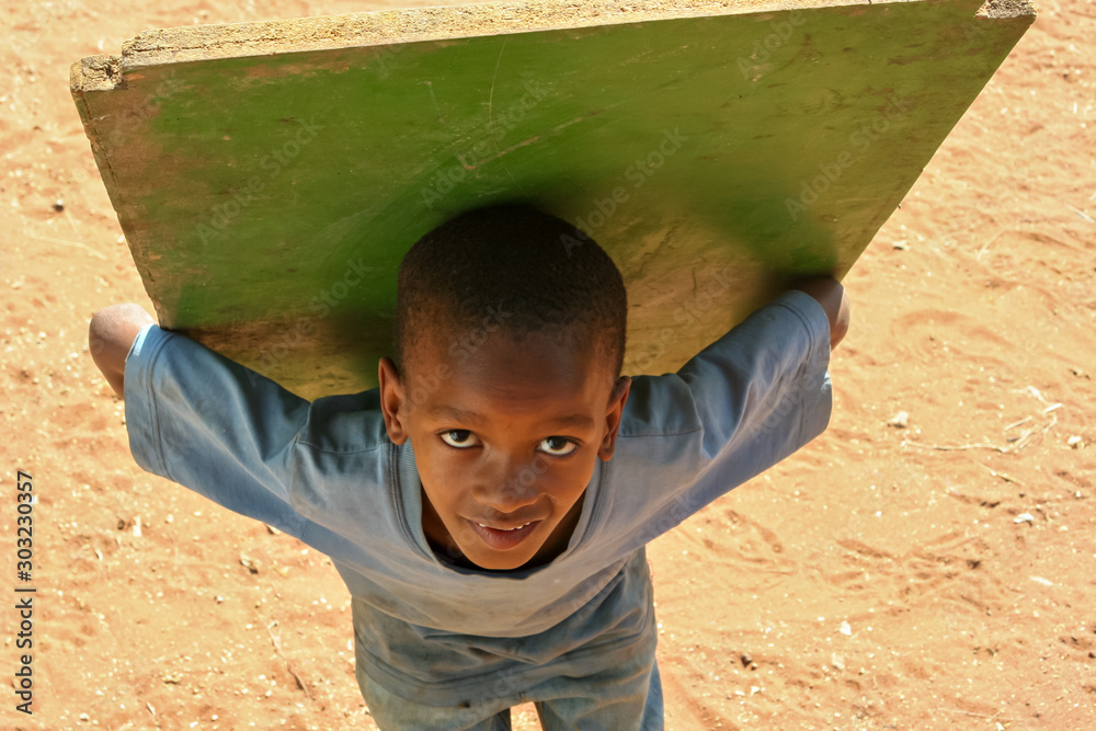 Child labor Stock Photo | Adobe Stock