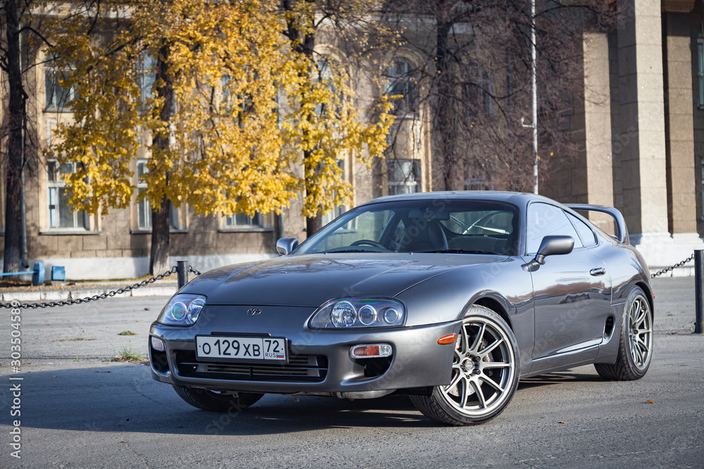 A very rare Japanese sports car in the back of a Toyota Supra coupe in ...