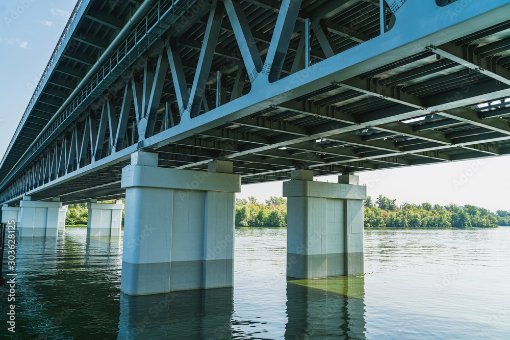 Steel bridge structure, view from below and close up. Big bridge ...