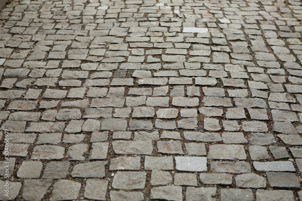 Grey ancient brick road texture background from square stones antique ...