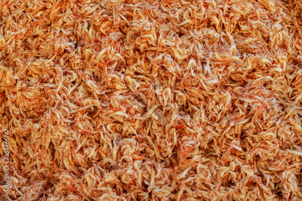 Very small shrimp. Stack of baby prawns top view. Baby shrimp ...