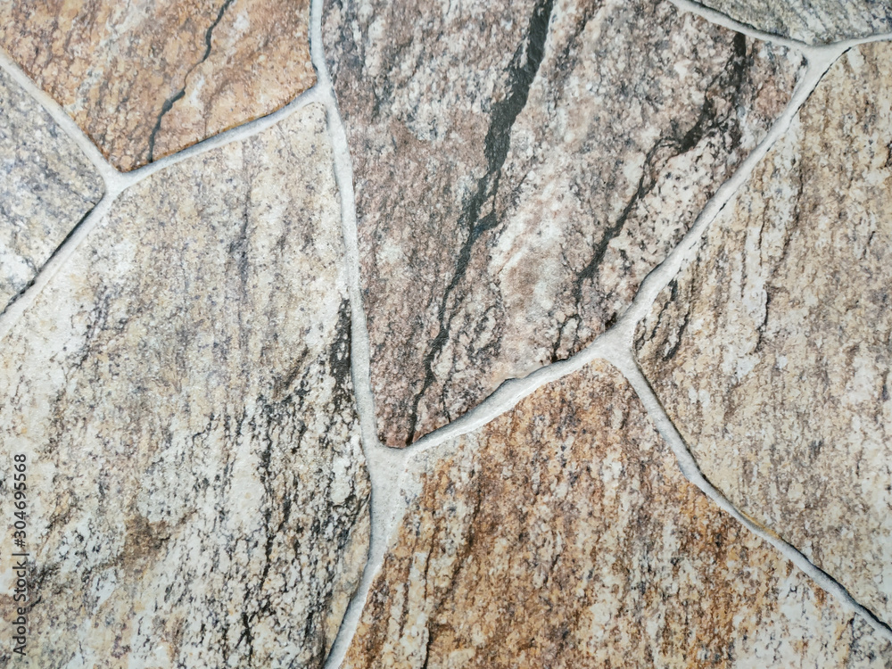 Mosaic of stone rocks looking like natural ones made into brick tiles ...