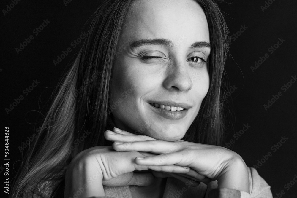 young pretty sexy girl in gray jacket and transparent black blouse ...