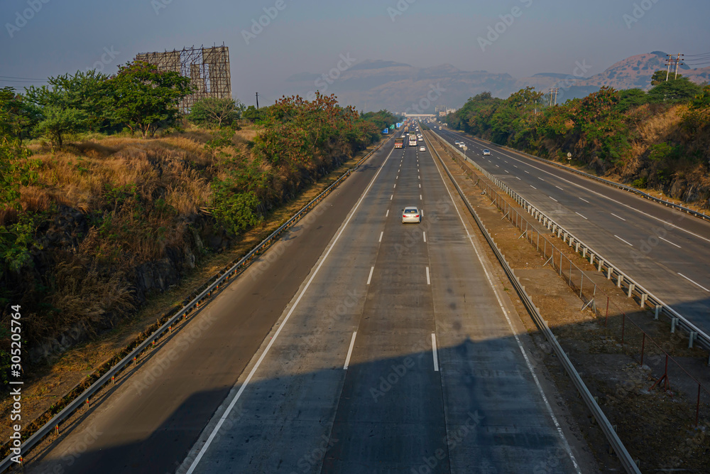 The Mumbai Pune Expressway early morning near Pune India. The ...