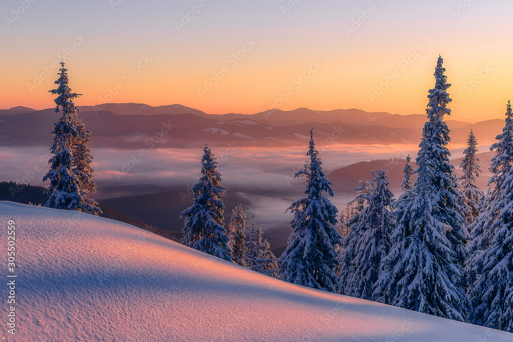 Amazing sunrise in the mountains. Sunset winter landscape with snow ...