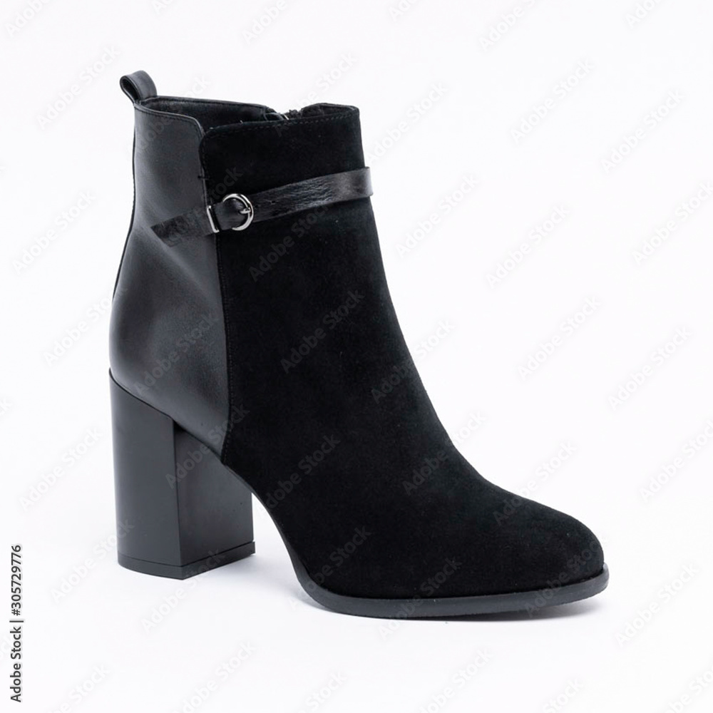 beautiful stylish womens ankle boots on a heel. On white background ...