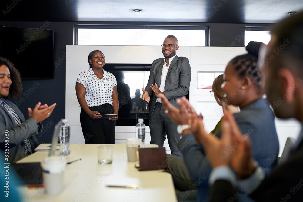 african american business people in presentation with black audience ...