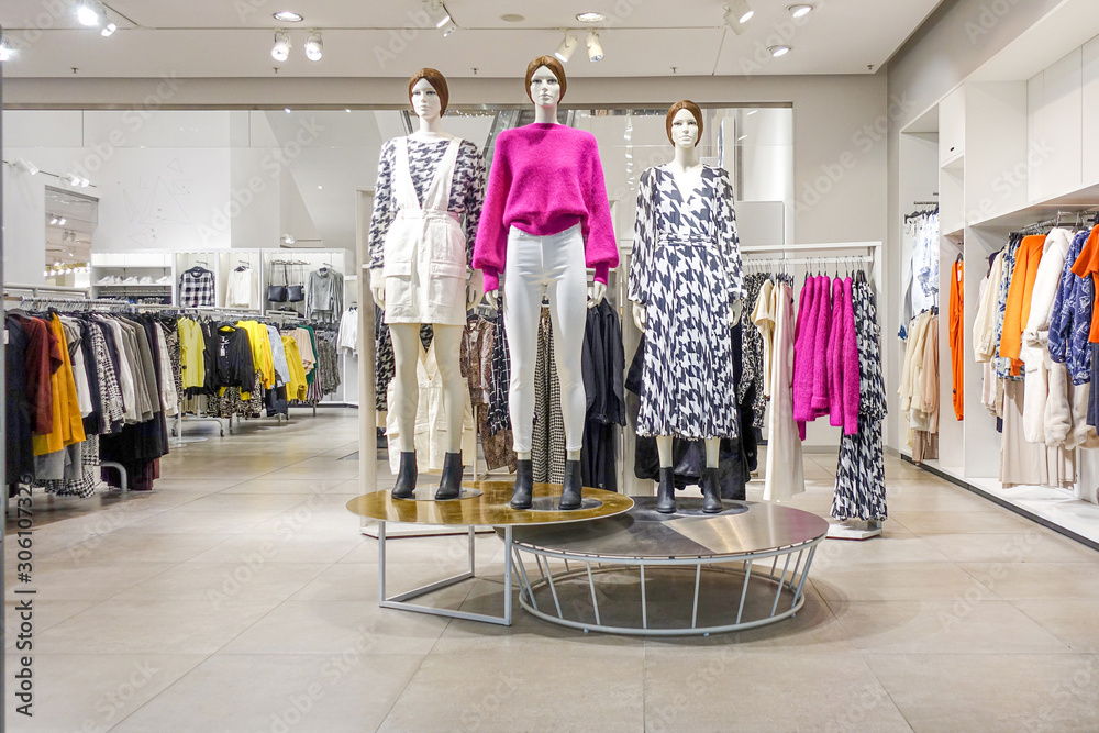 Modern fashionable brand interior of clothing store inside shopping ...