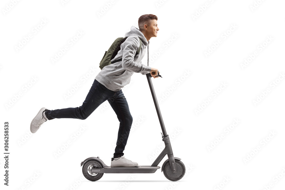 Male student with a backpack riding an electric scooter Stock Photo ...