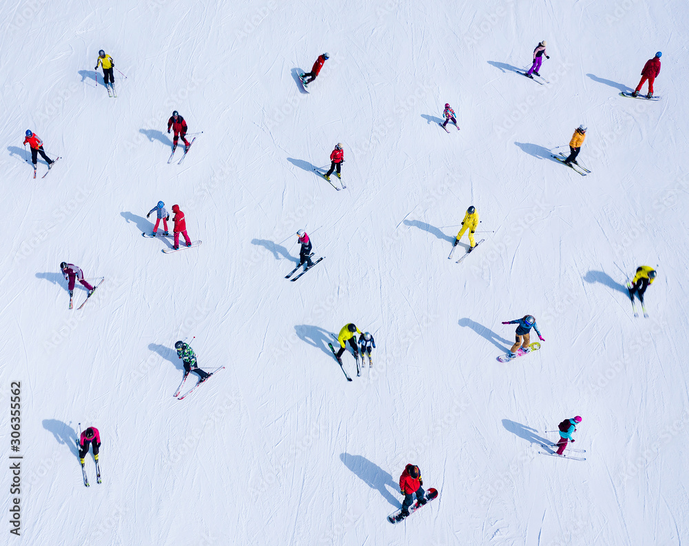 Background of many skiers and snowboarders. Winter sports Stock Photo ...