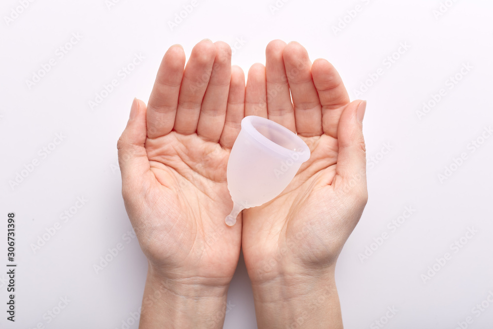 Horizontal shot of hands putting together over white background indoors ...