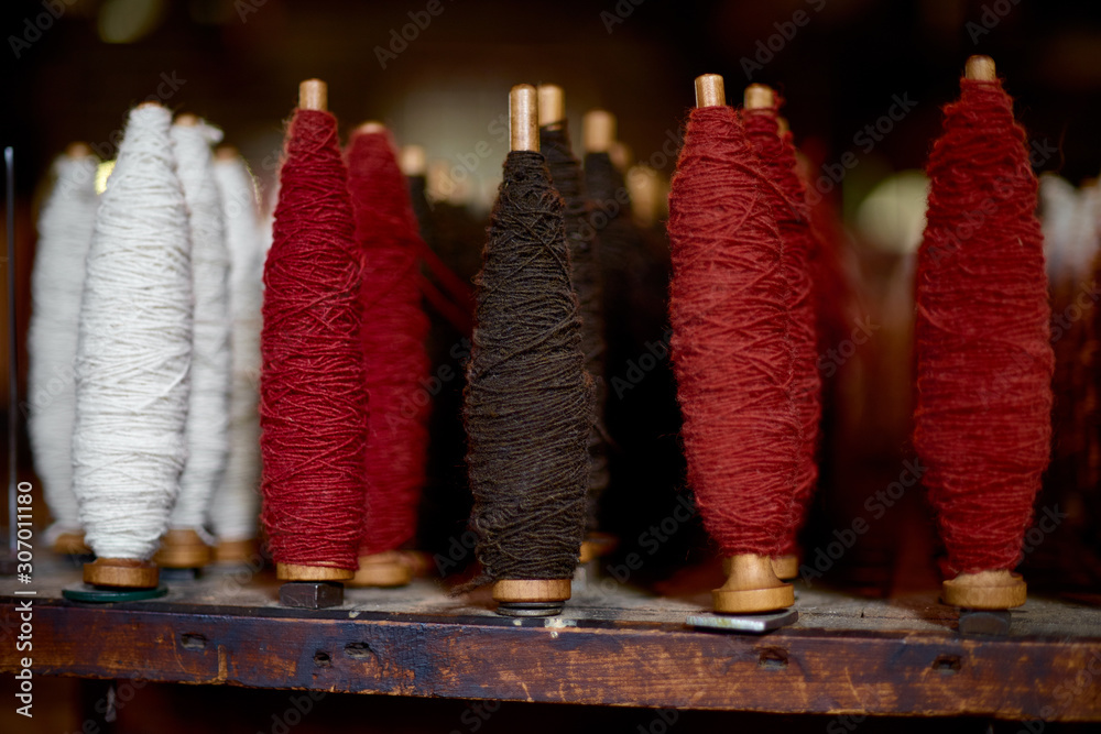 colored woolen threads on an old loom, Traditional Yarn in Canada ...