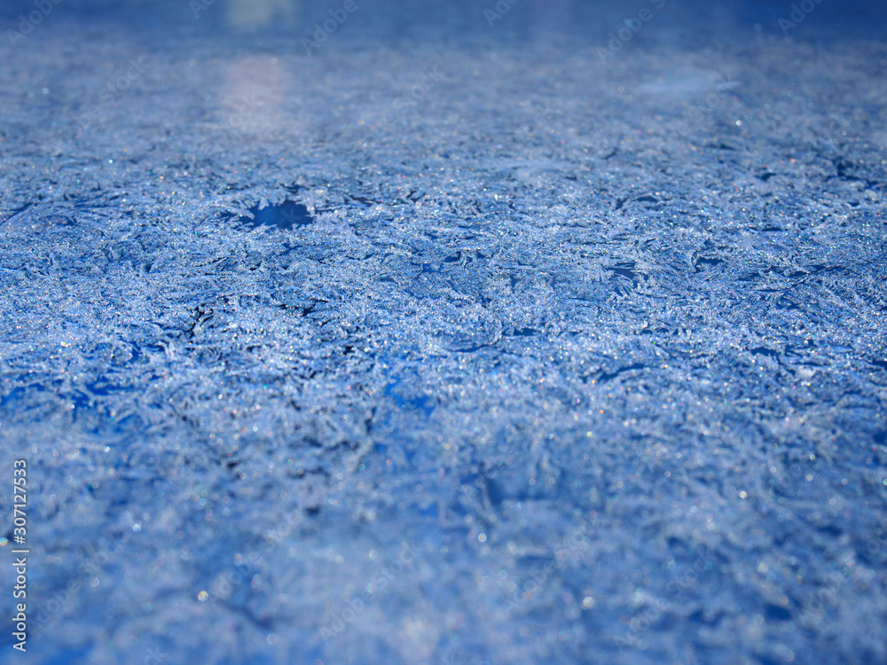 Sheet of ice, with incredible fractals formed on the frozen surface ...