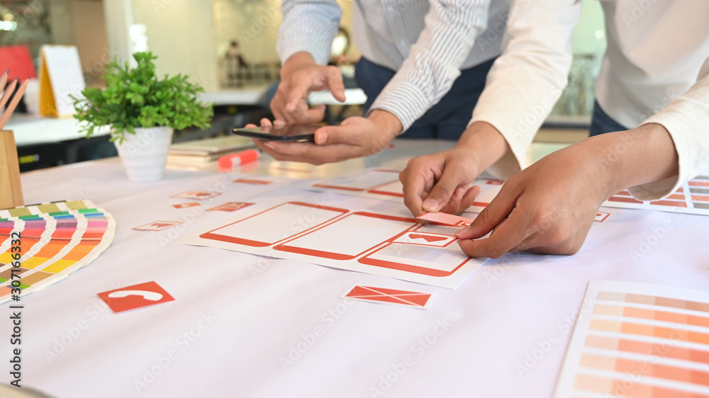UX UI design with working team of development mobile application. Stock ...