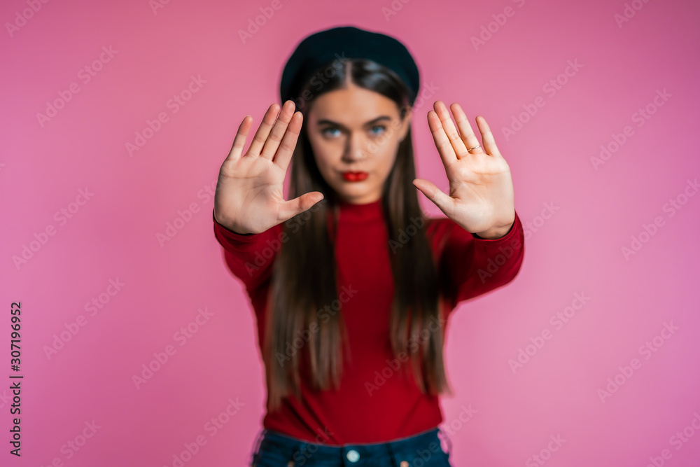 Angry annoyed woman raising hands up to say no stop. distrustful look ...