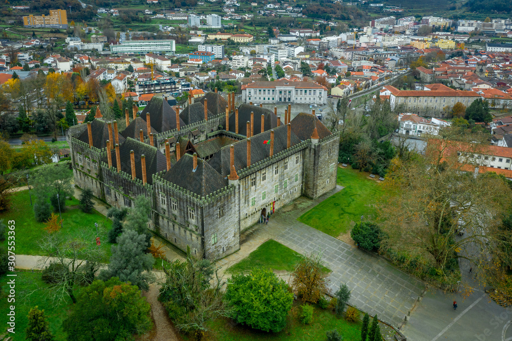 Aerial view of well-preserved medieval buildings hilltop, 10th-century ...