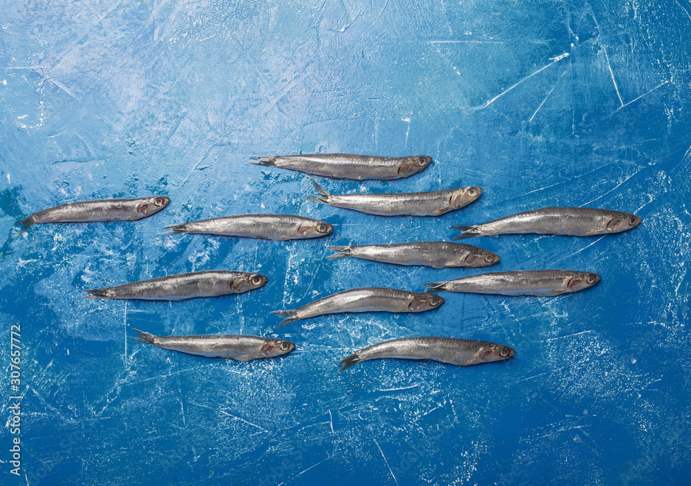Seafood. Small sea fish, anchovies. Top view, fish pattern, classic ...