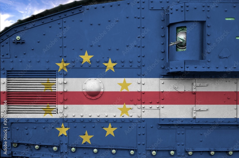 Cabo verde flag depicted on side part of military armored tank closeup ...
