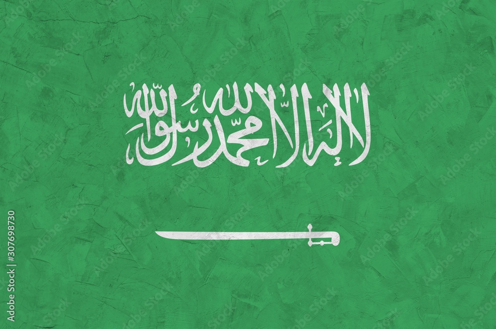 Saudi Arabia flag depicted in bright paint colors on old relief ...