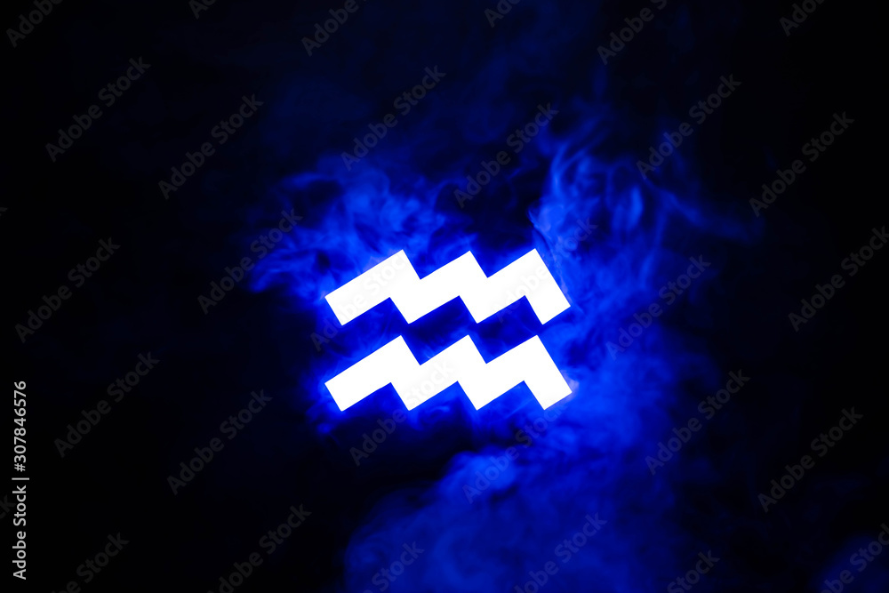 blue illuminated Aquarius zodiac sign with smoke on background Stock ...