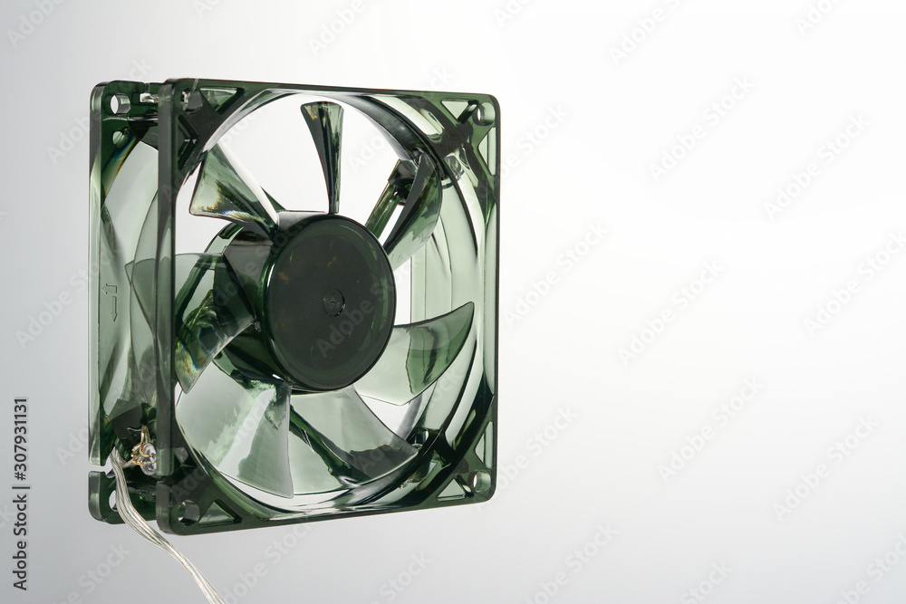 Computer translucent fan. Left side view of semitransparent pc cooler ...