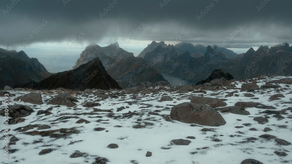Foto de Stock View from the top of Mount Munken to fjord under a stormy ...