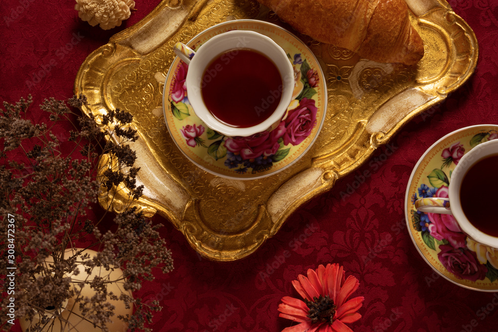 Vintage style tea time. Top view of old fashioned floral tableware of ...