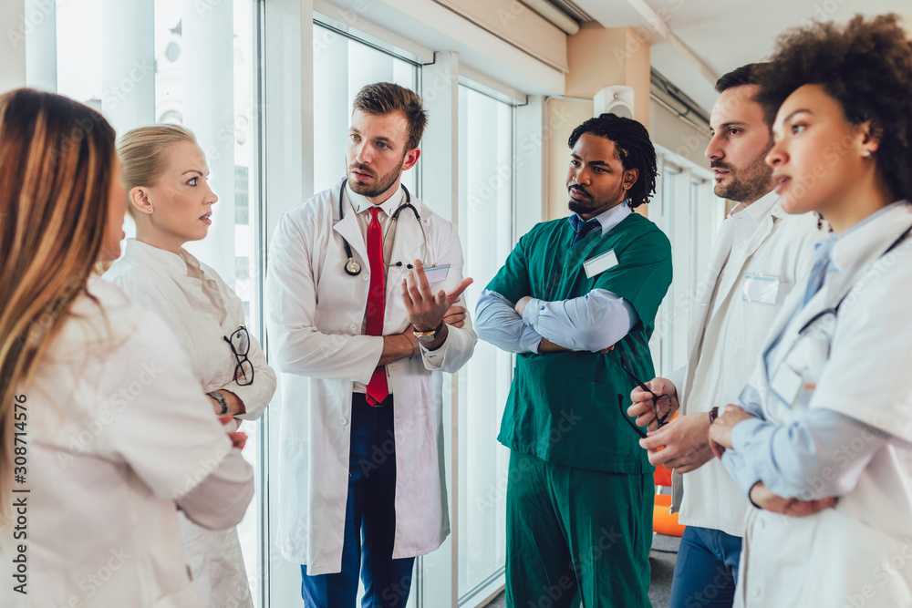Medical team discussing in the office. Stock Photo | Adobe Stock