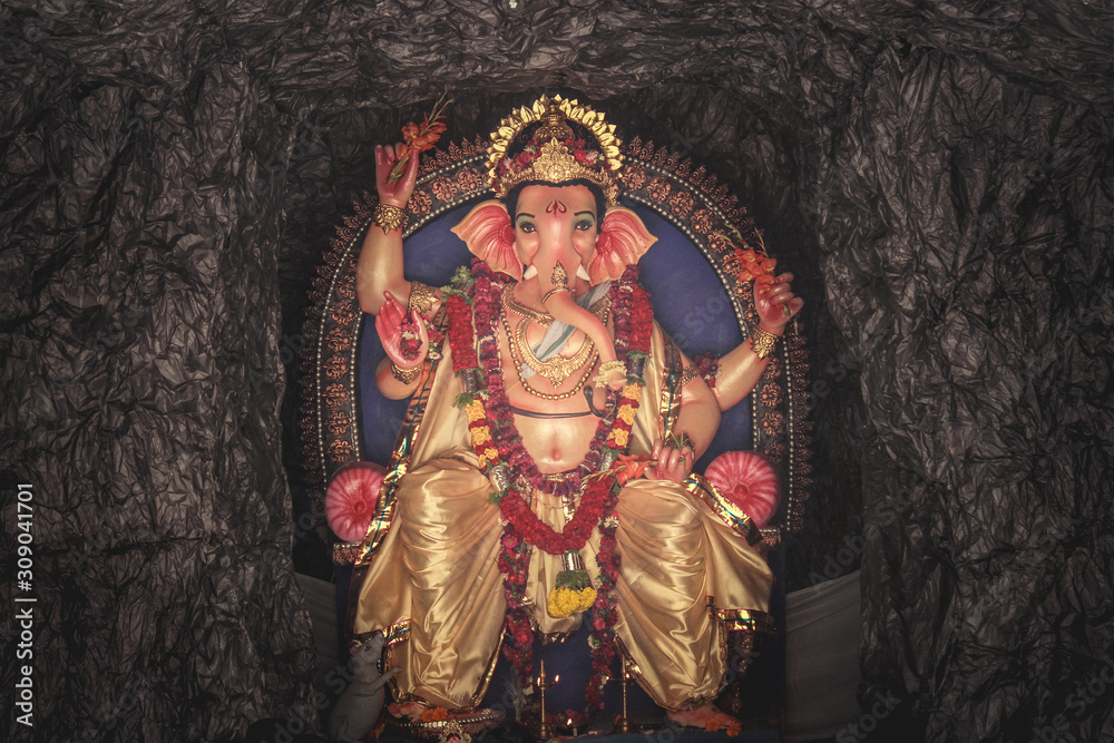 idle of lord ganesha on cave background Stock Photo | Adobe Stock
