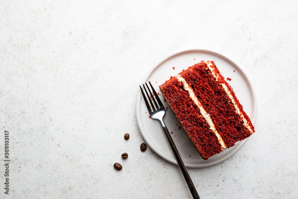 Top view of slice of red velvet cake with copy space on white ...