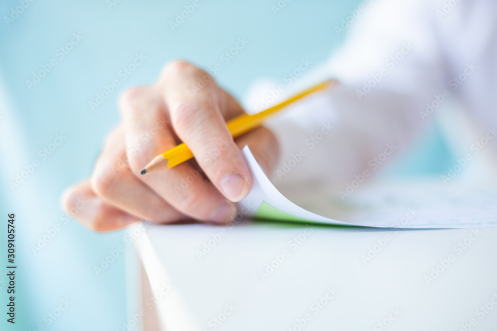 high school,university student study.hands holding pencil writing paper ...