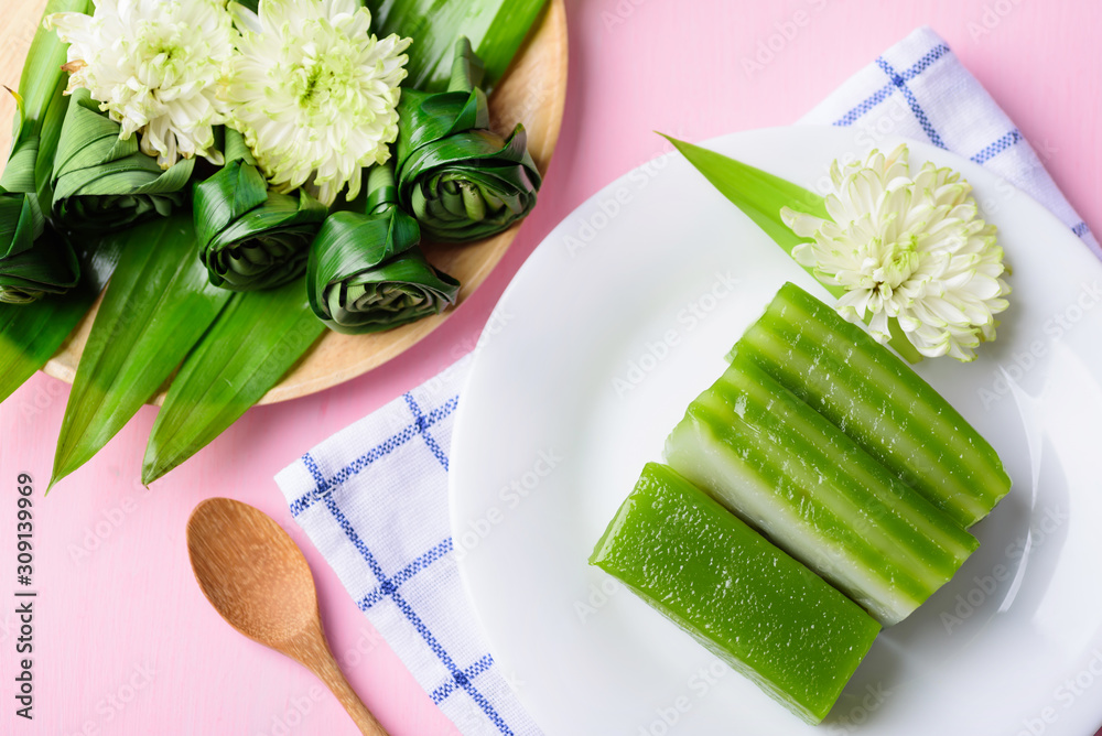 Thai dessert (Khanom chan), steamed layer sweet cake with pandan flavor ...