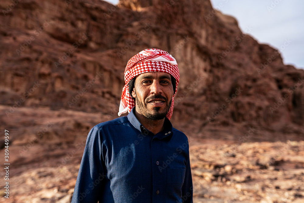 Arabic Man Standing Near Mountains Stock Photo | Adobe Stock