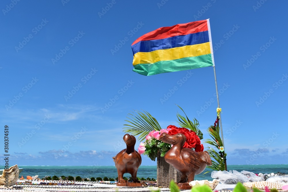Picture of a wooden statue representing the symbol of Mauritius the ...
