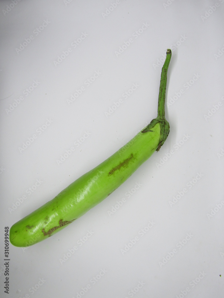 Close up view of green color eggplant or terung terong hijau or ...