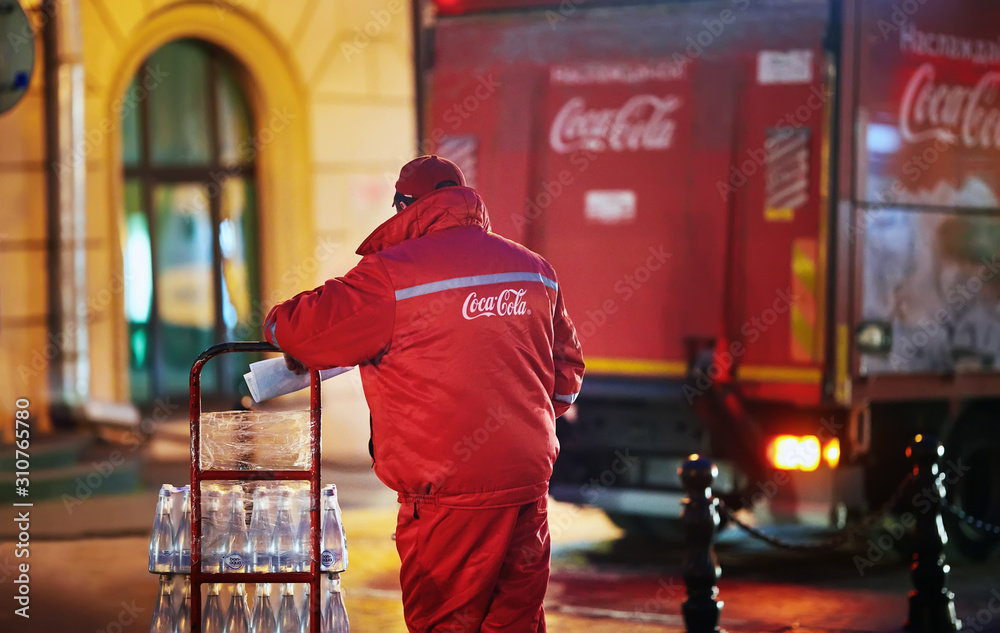 Minsk, Belarus. Oct 2019. Man with trolley full off bottles make ...