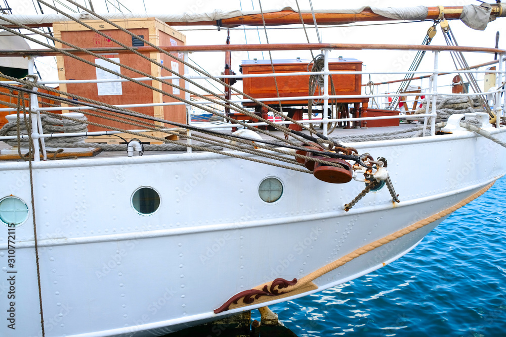 Stern section of a classic tall ship, close view, lifelines wooden ...