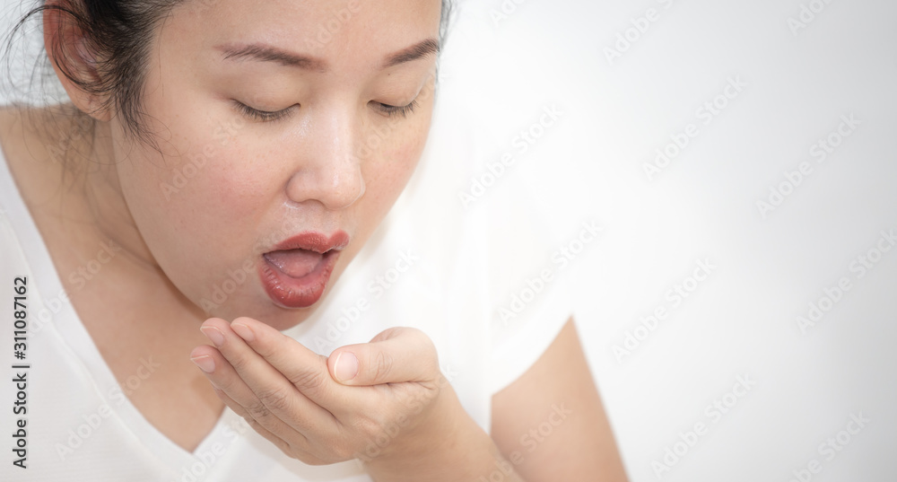 The image of an Asian woman is vomiting because of a bacterial ...