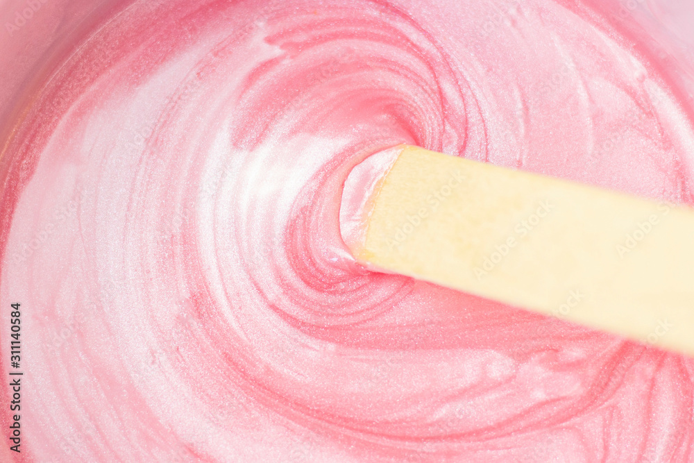 background texture liquid wax for depilation of pink color with mother ...