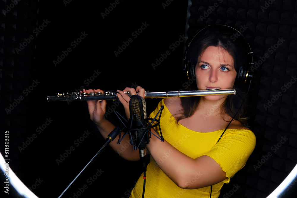 Record wind musical instruments with a professional microphone, black ...