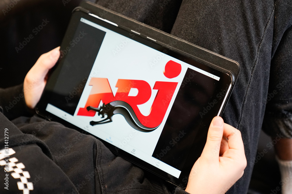 nrj sign logo screen tablet private modern music French radio station ...