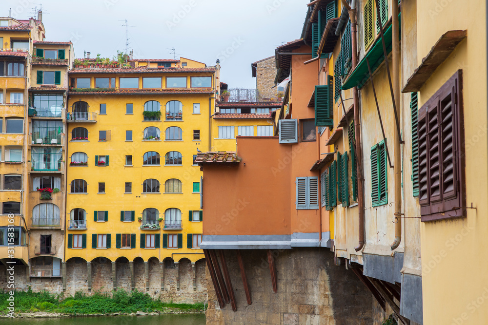The Ponte Vecchio, a medieval stone closed-spandrel segmental arch ...