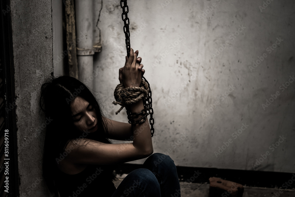 Asian hostage woman Bound with rope at night scene,The thieves ...